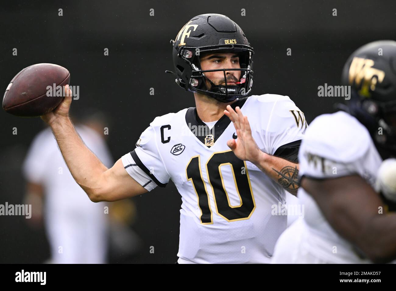Wake Forest quarterback Sam Hartman (10) passes during an NCAA college ...