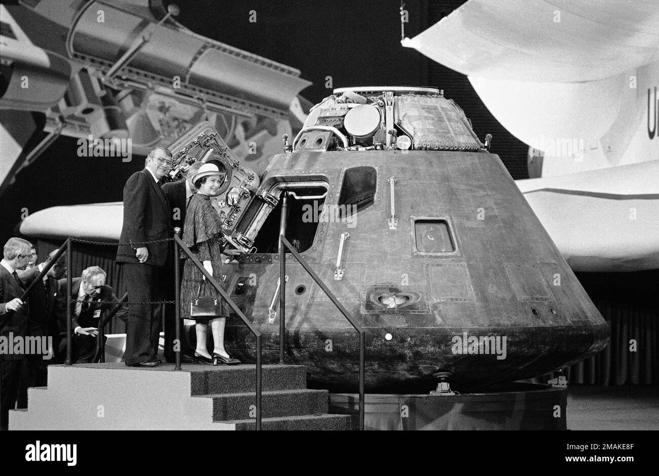 Britain's Queen Elizabeth II looks inside the Apollo 14 command module ...