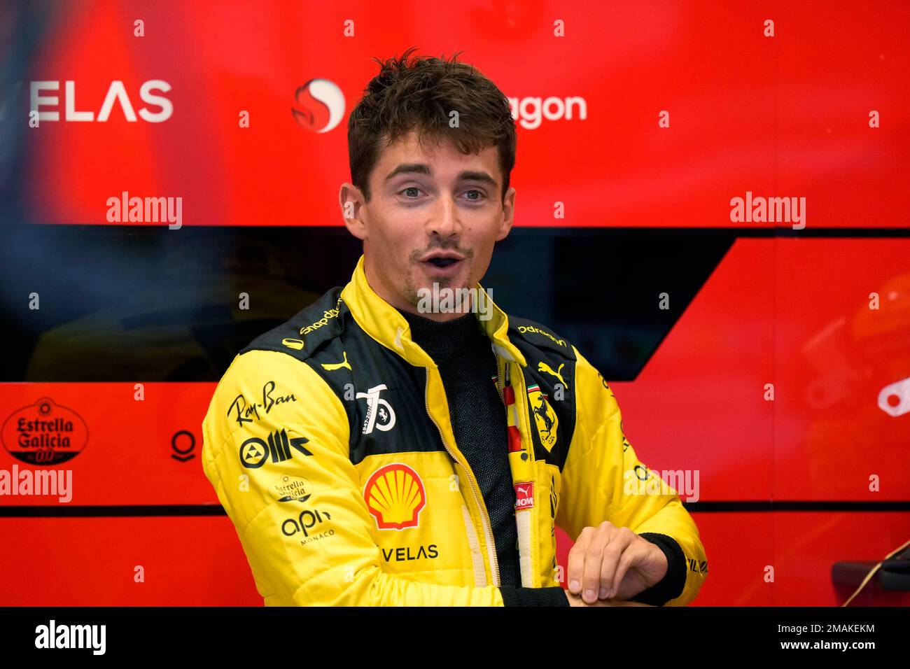 Ferrari driver Charles Leclerc of Monaco smiles at pits during the ...