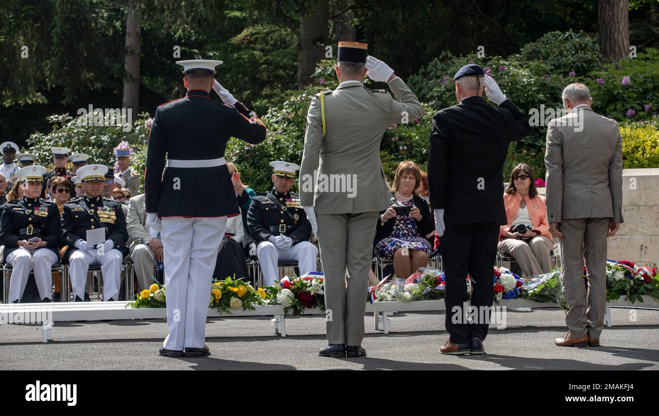 Special guests salute during a ceremony at Aisne-Marne American ...