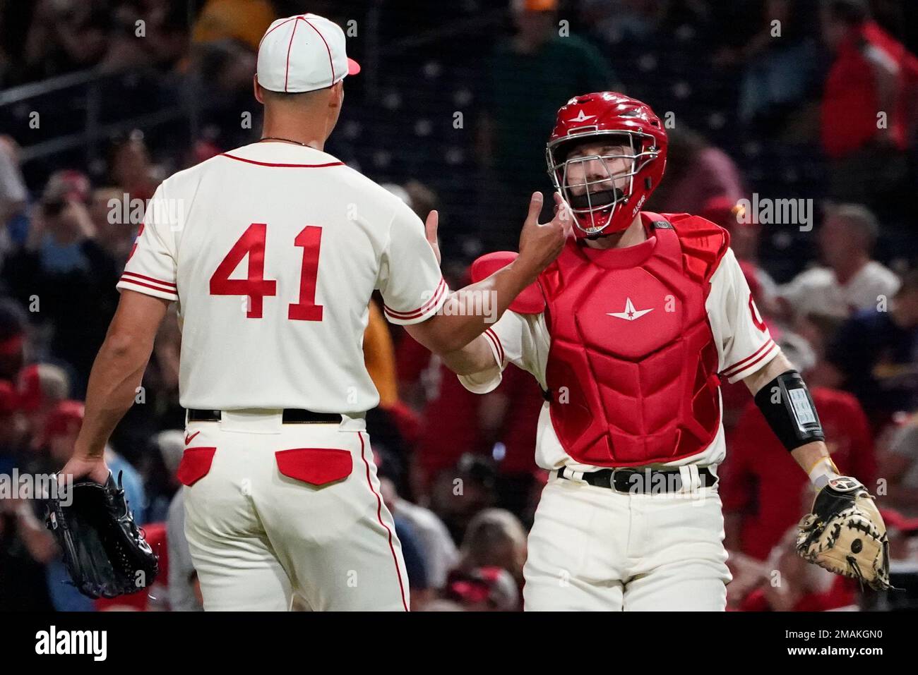 Pittsburgh Pirates relief pitcher Robert Stephenson (41) greets catcher ...