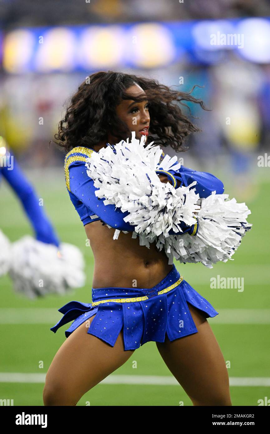 A Los Angeles Rams cheerleader performs during an NFL football game ...