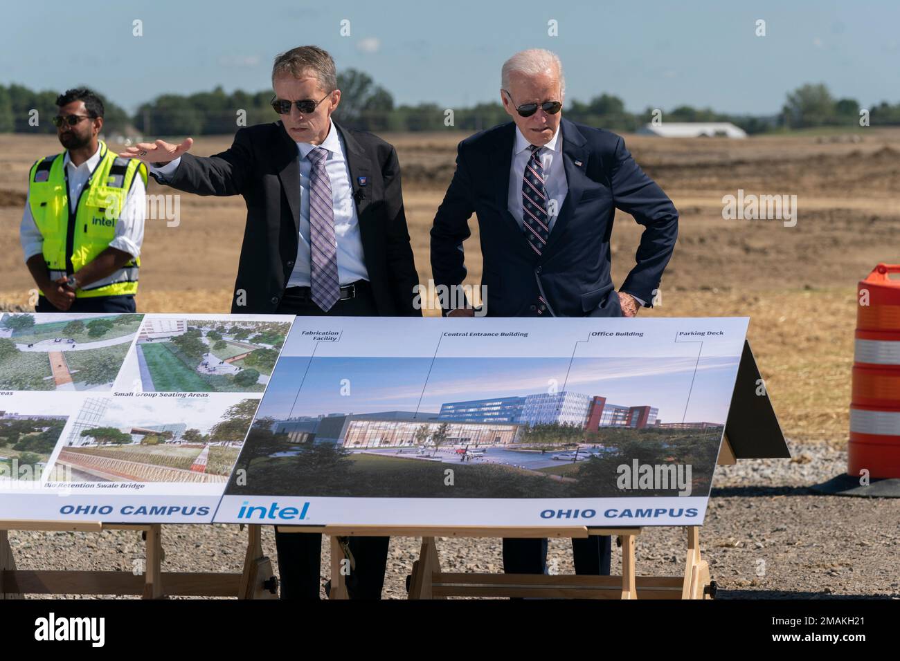 President Joe Biden speaks with Intel CEO Pat Gelsinger at the ...