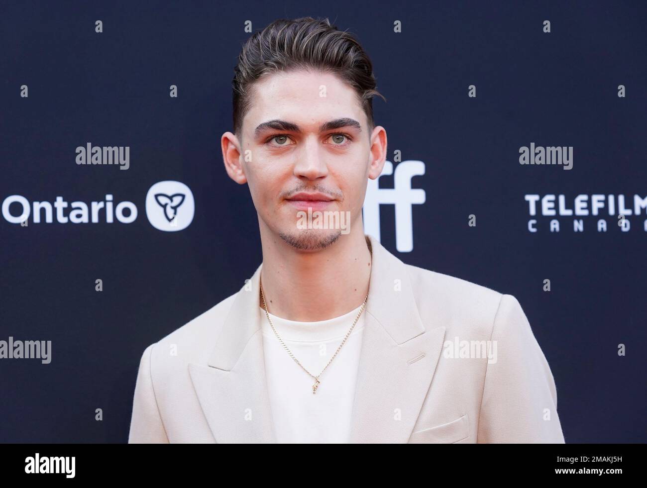 Hero Fiennes Tiffin attends the premiere for "The Woman King" on day ...