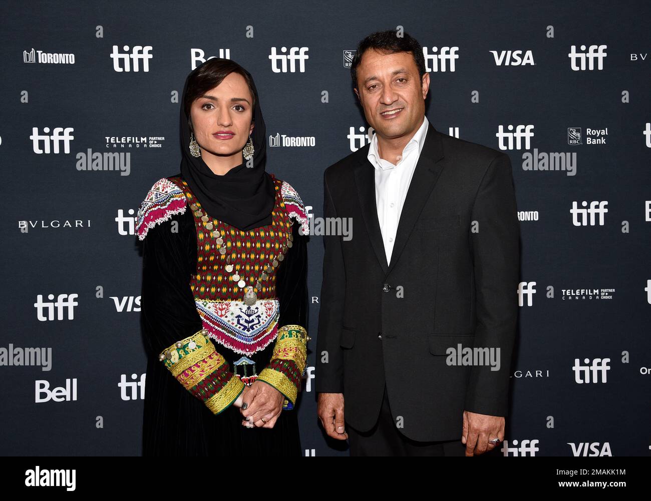 Zarifa Ghafari, left, and Bashir Mohammadi attend the premiere for "In ...