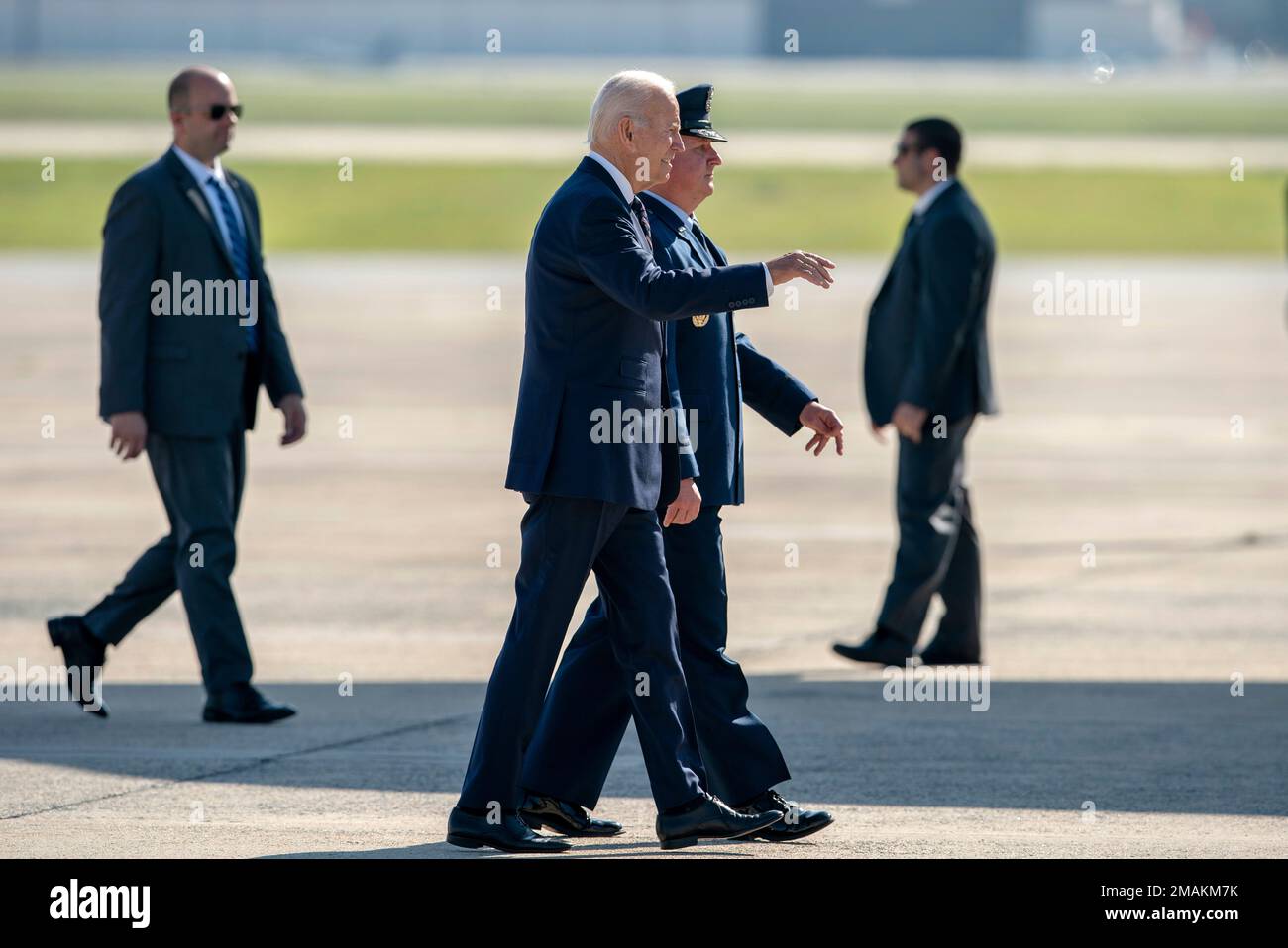President Joe Biden escorted by Colonel Matthew Jones, Commander, 89th ...
