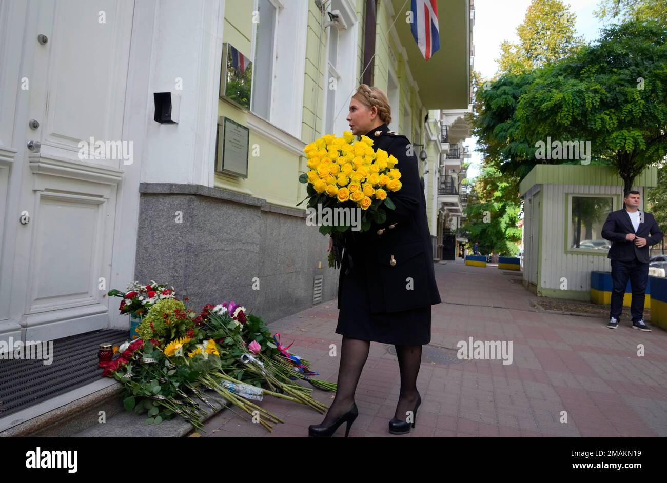 Former Ukrainian Prime Minister Yulia Tymoshenko lays flowers in ...