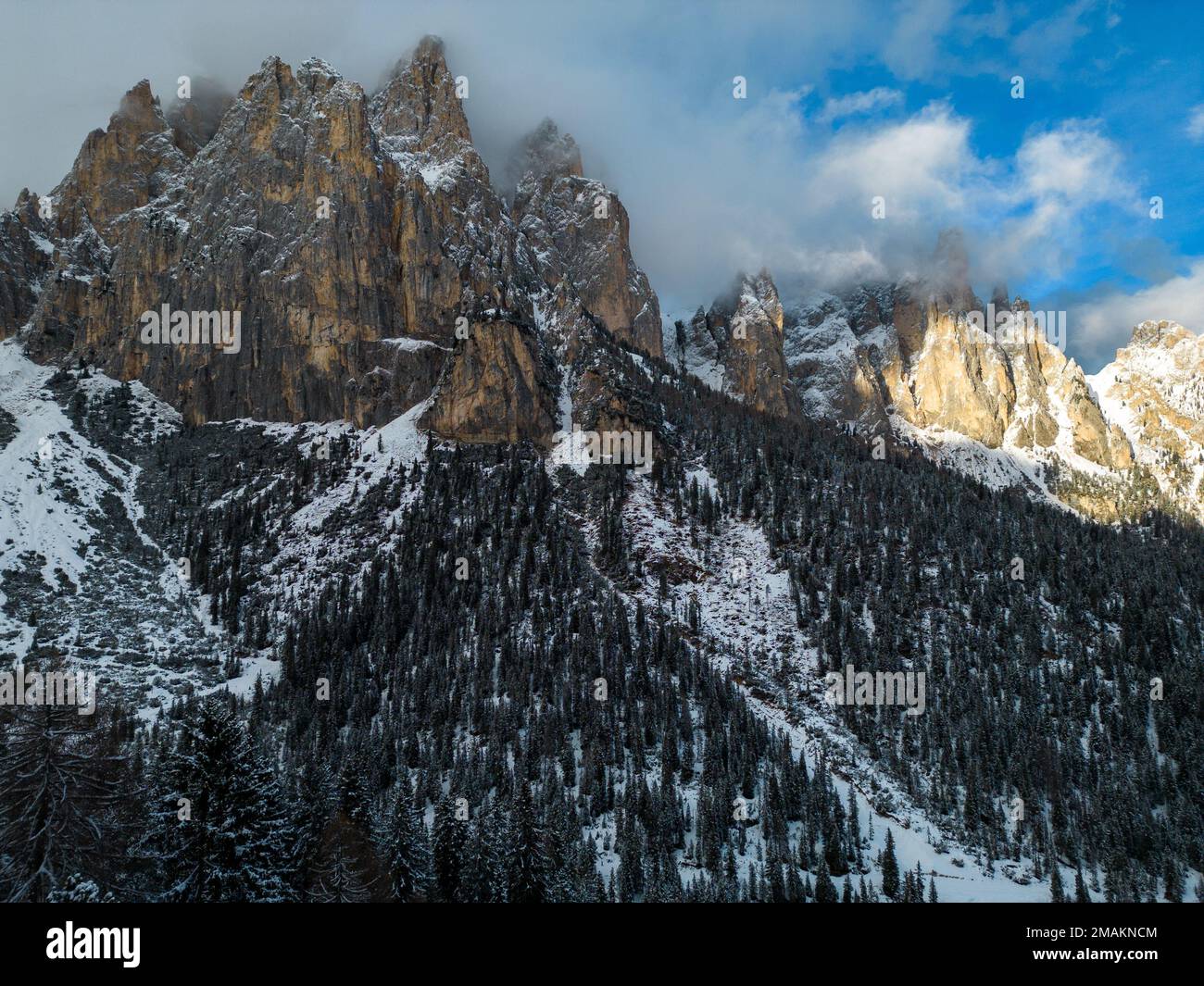 A drone shot of Rosengarten Group massif in the Dolomites of northern ...