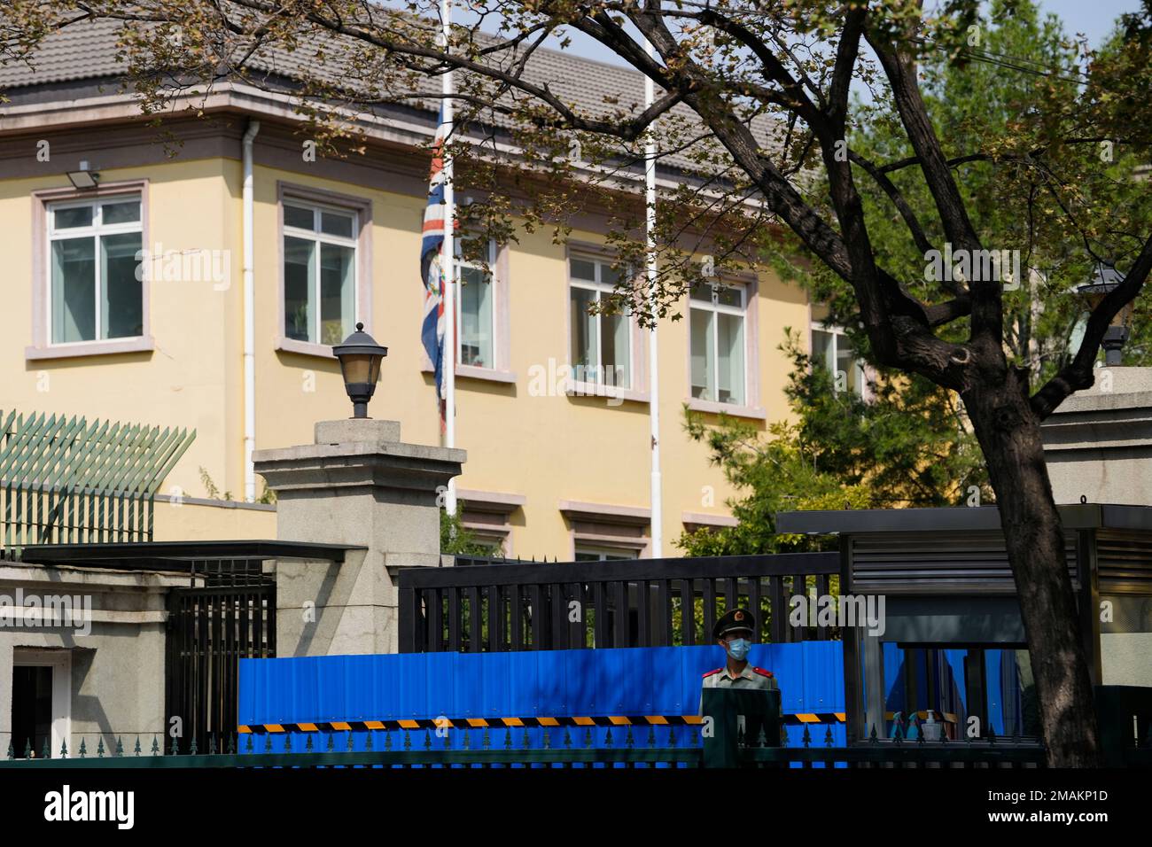 A paramilitary police officer guards the entrance to the British ...