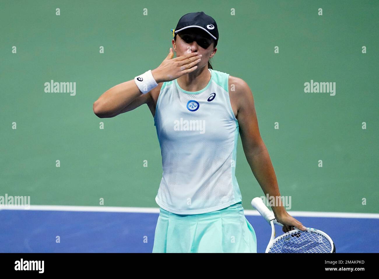 Iga Swiatek, of Poland, blows a kiss after defeating Aryna Sabalenka ...