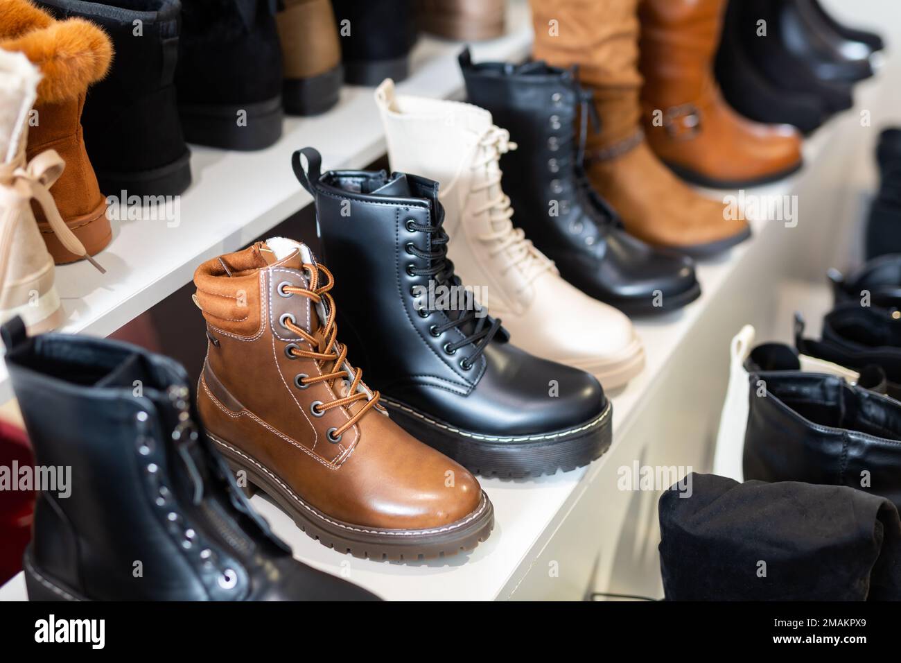 Showcase with casual stylish shoes Stock Photo - Alamy