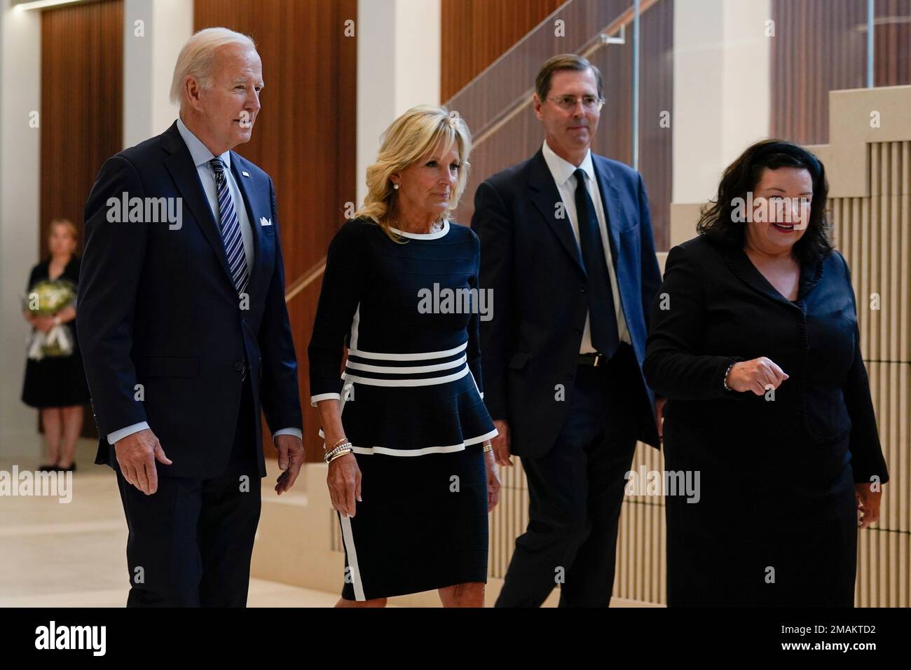 President Joe Biden and first lady Jill Biden walk with British ...