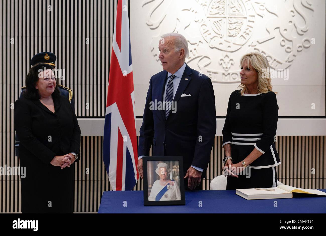 President Joe Biden speaks after signing a condolence book at the ...