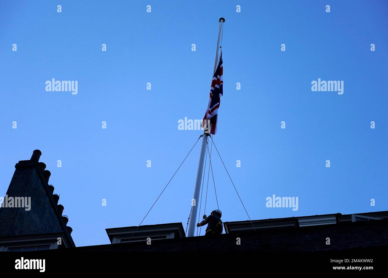 The Union flag is lowered on Downing Street in London after the death ...