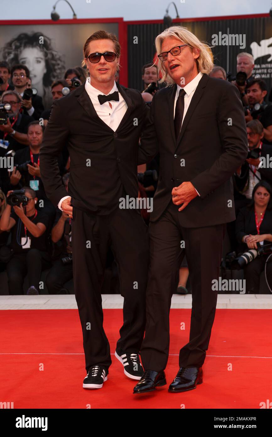 Brad Pitt left, and director Andrew Dominik pose for photographers upon ...