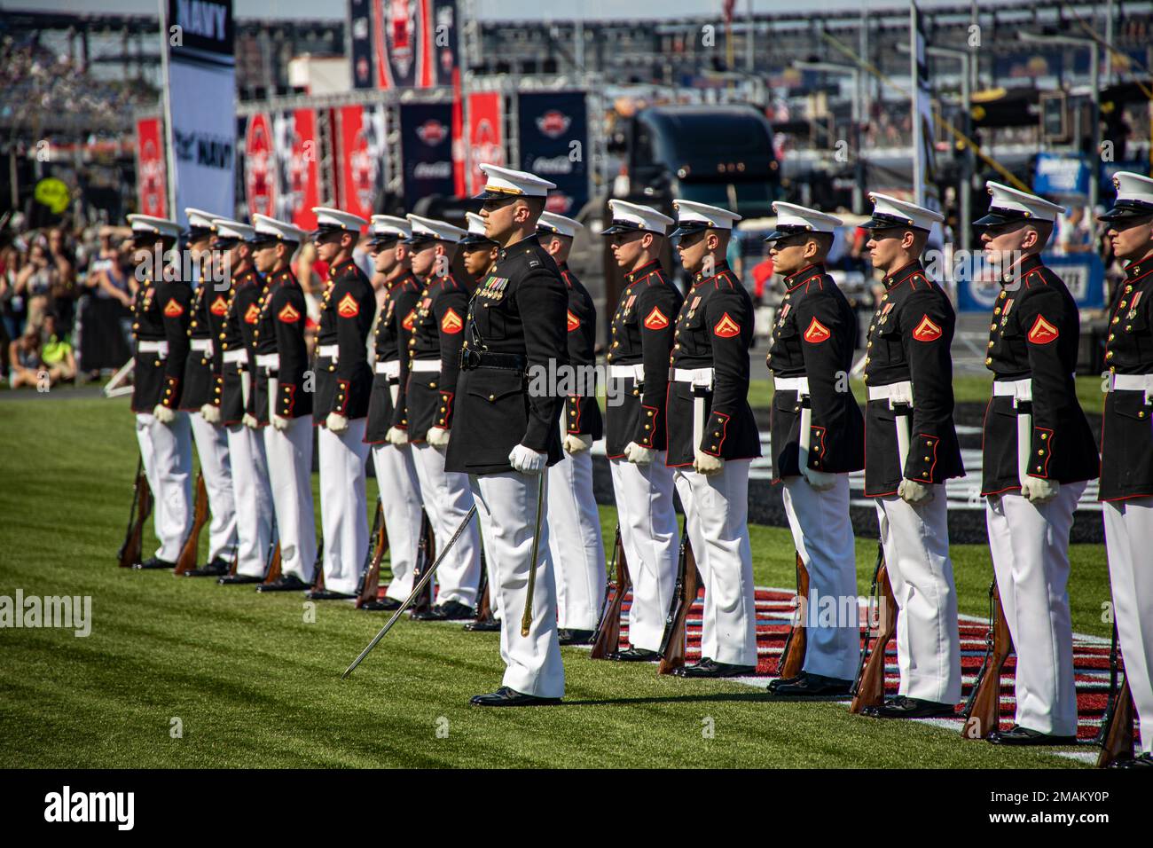 Marines with the Silent Drill Platoon stand at the position of ...