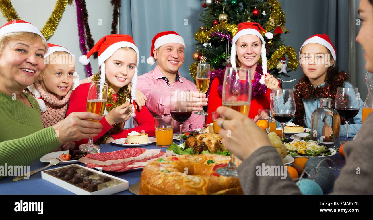 Family celebrating New Year together Stock Photo - Alamy