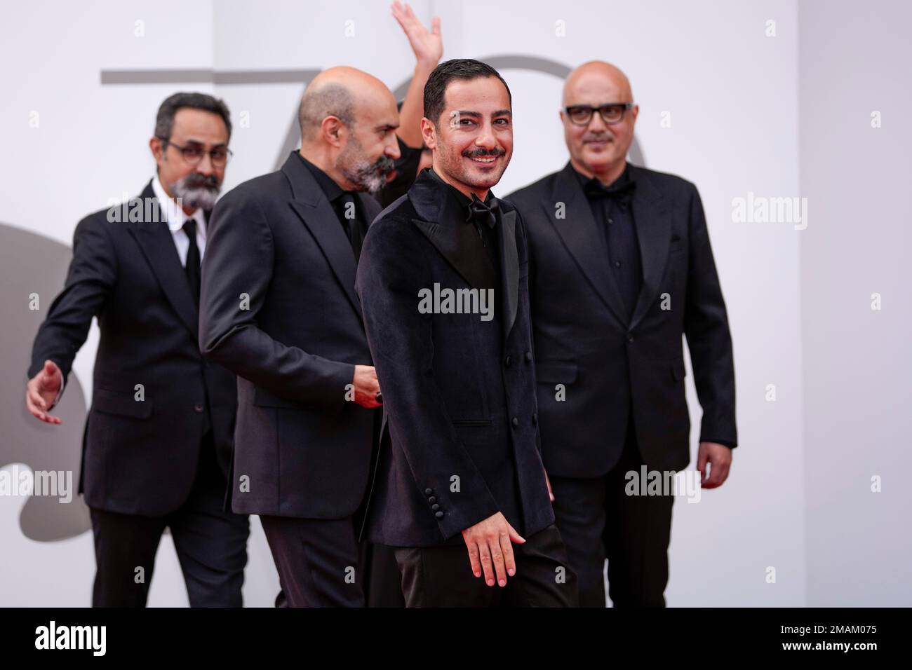Navid Mohammadzadeh, center, poses for photographers upon arrival at ...
