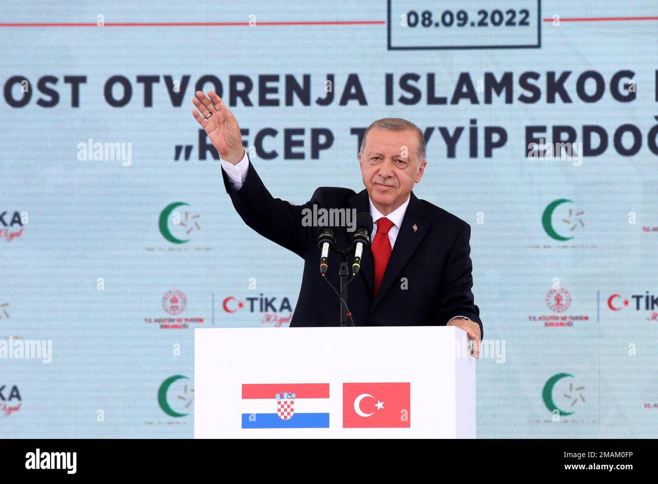 Turkey's President Recep Tayyip Erdogan greet the audience as he ...