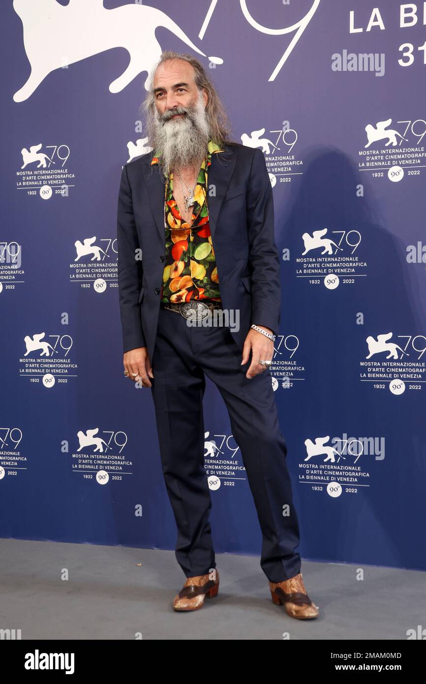 Composer Warren Ellis poses for photographers at the photo call for the ...