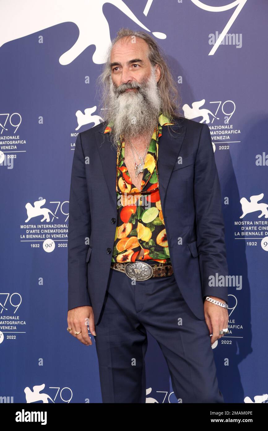 Composer Warren Ellis poses for photographers at the photo call for the ...