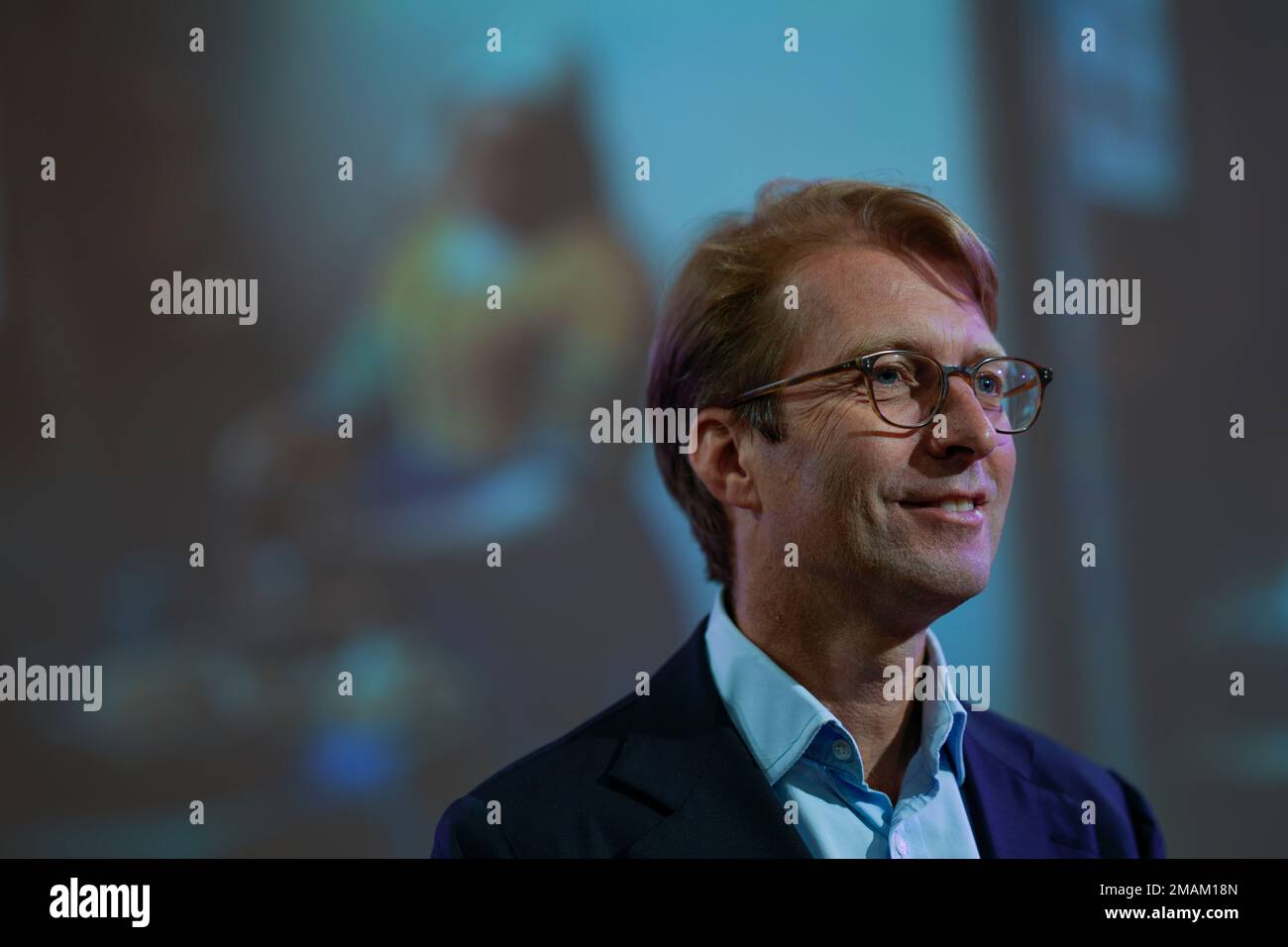 Rijksmuseum director Taco Dibbits is interviewed in front of projection ...