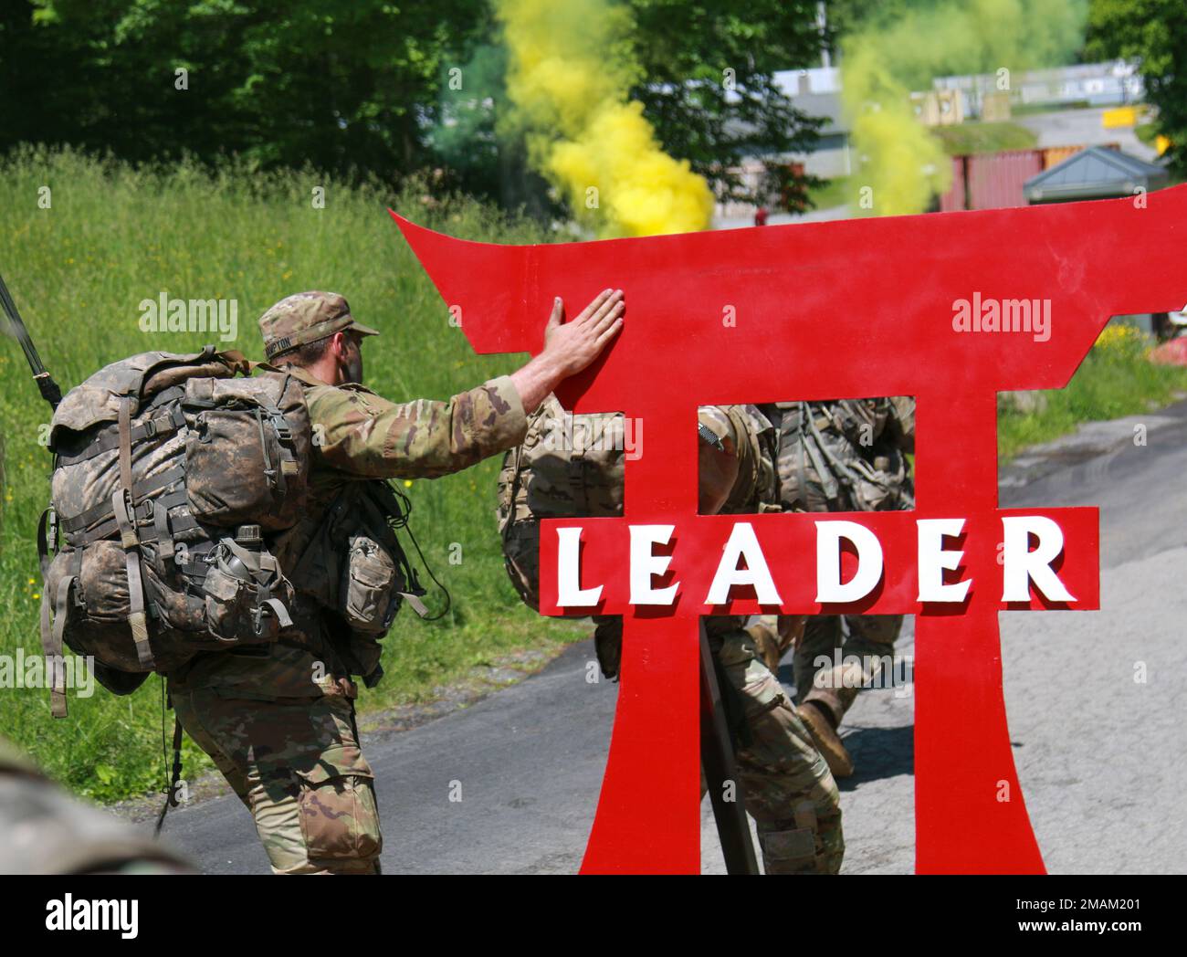 Cadets with the United States Military Academy tap the symbol of 1st ...