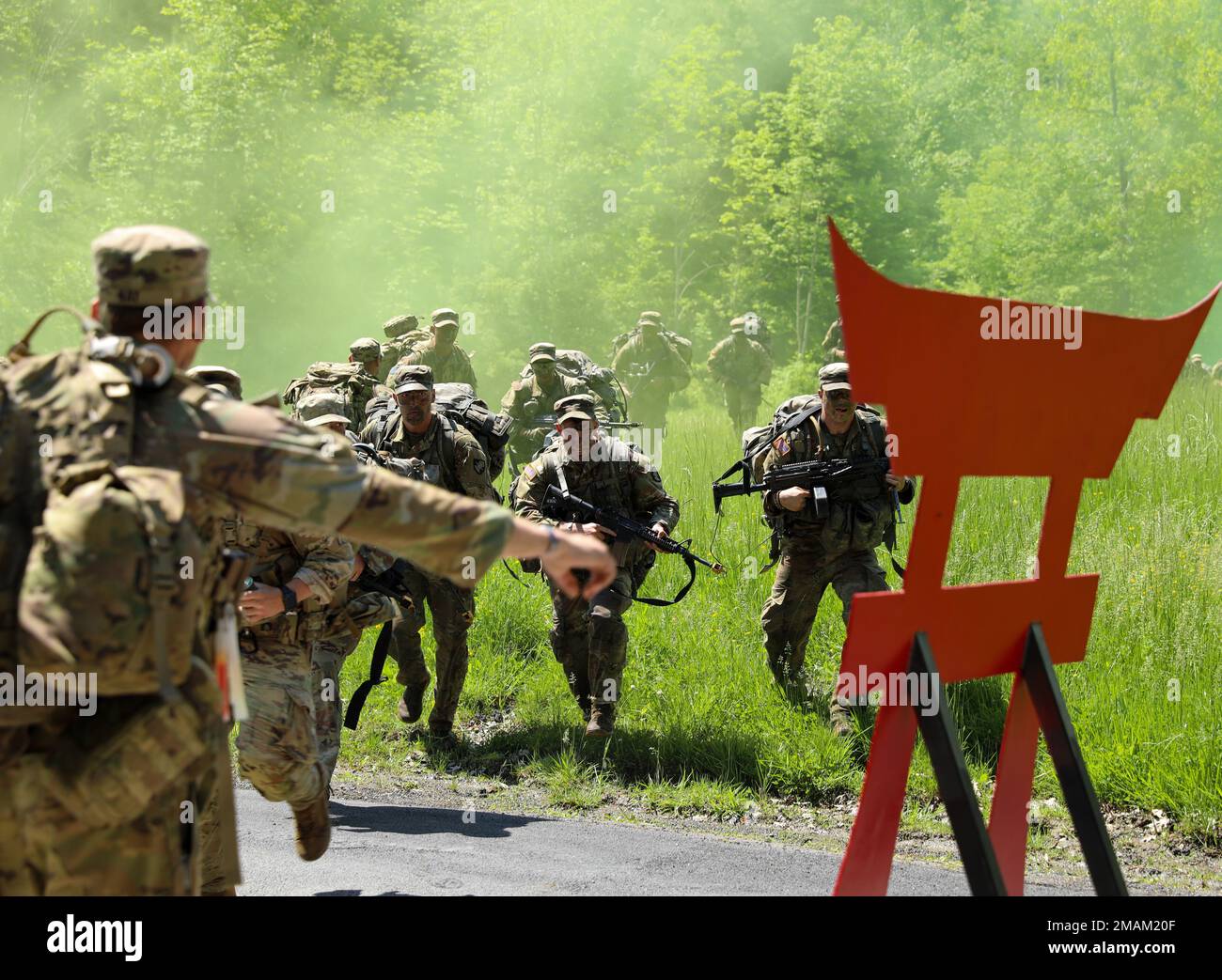 Cadets with the United States Military Academy tap the symbol of 1st ...
