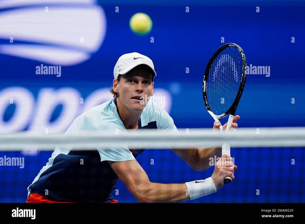 Jannik Sinner, of Italy, returns a shot against Carlos Alcaraz, of ...