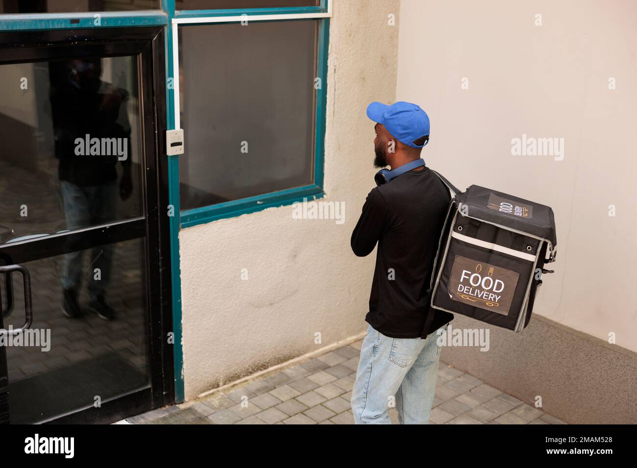Worker employee waiting front door hi-res stock photography and images ...