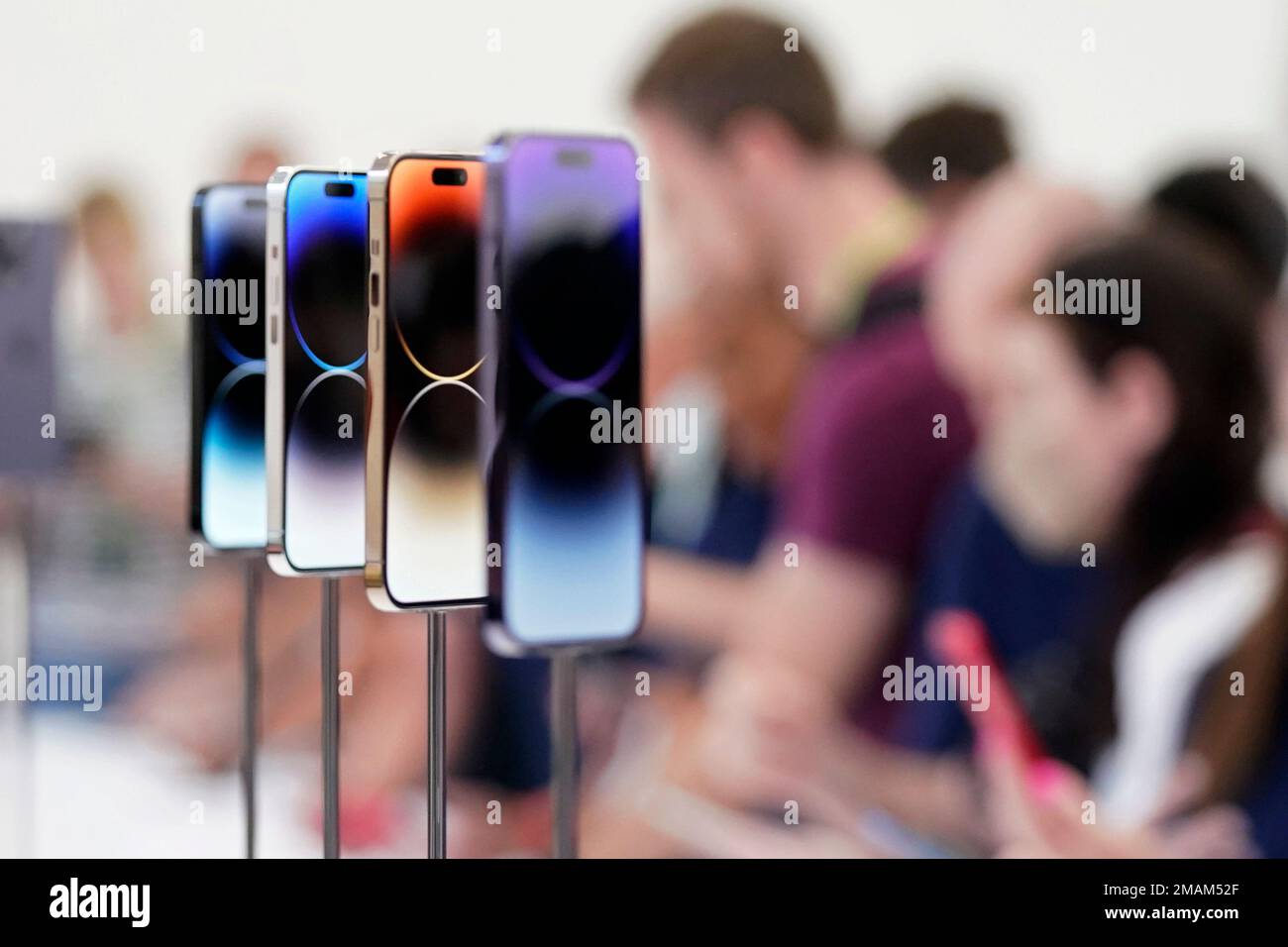 New iPhone 14 Pro models are on display at an Apple event on the campus ...