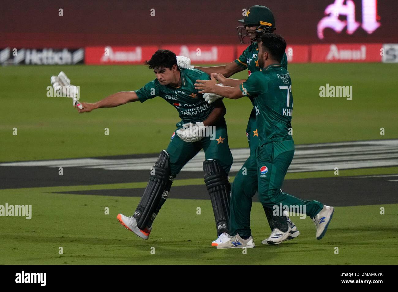 Pakistan's Naseem Shah, left, and teammates celebrate their win in the ...