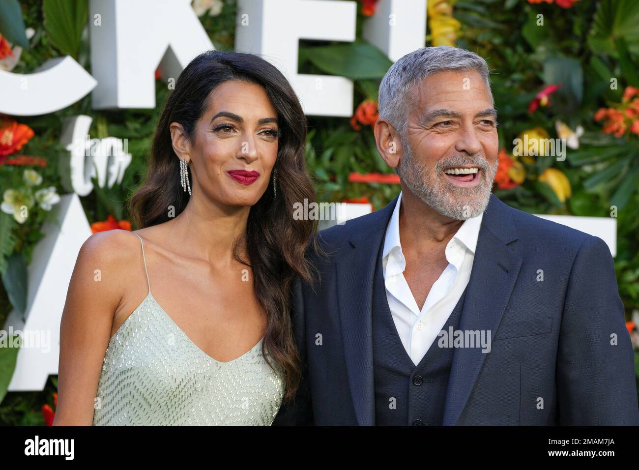 Amal Clooney, left, and George pose for photographers upon arrival for ...