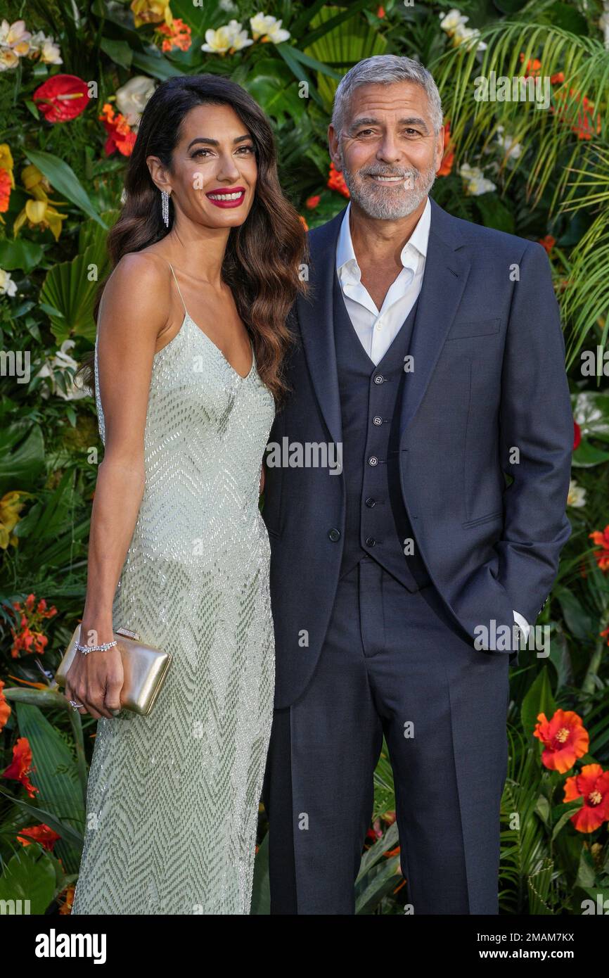 Amal Clooney, left, and George pose for photographers upon arrival for ...
