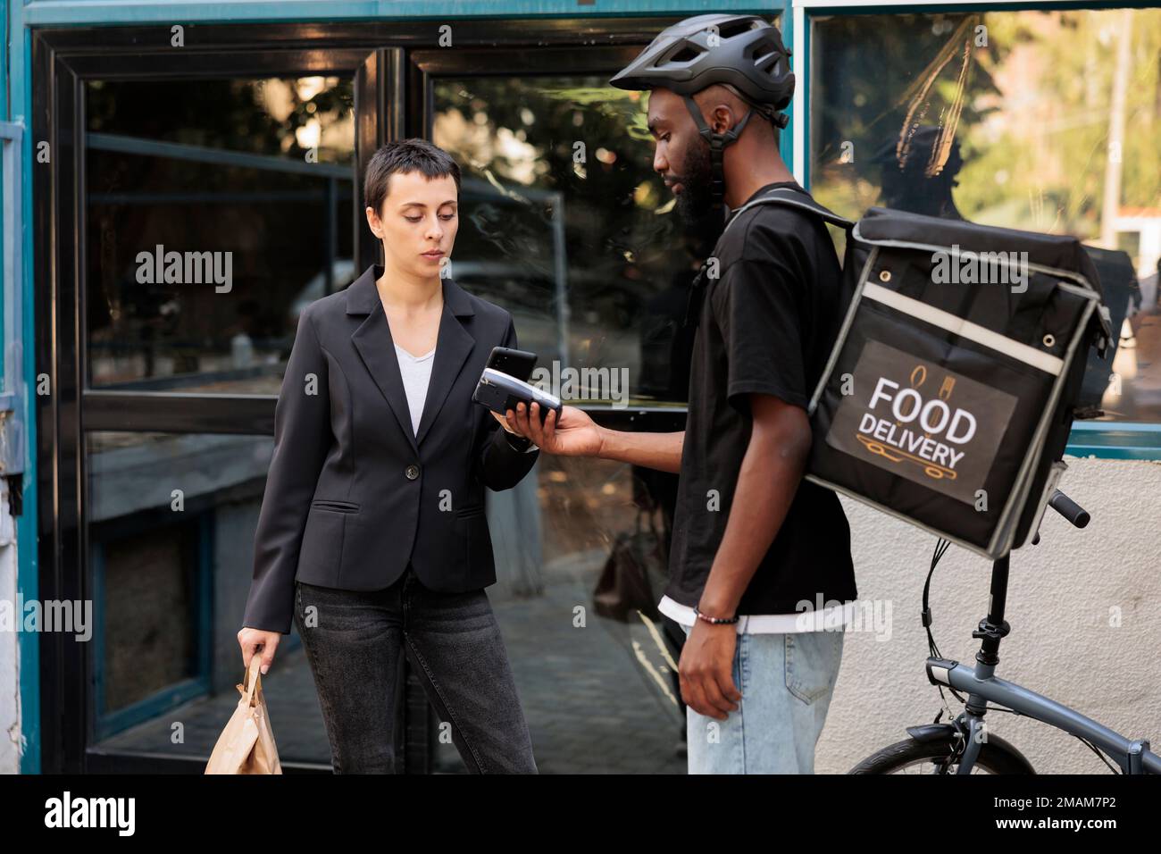 Office food delivery service, smartphone pos terminal payment, woman ...