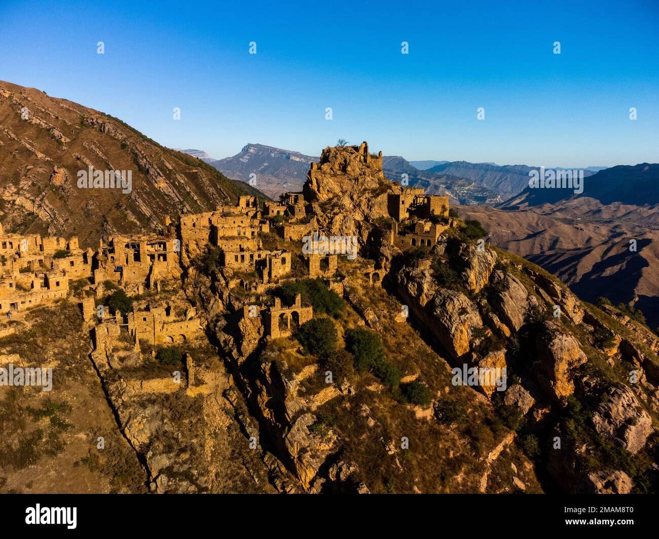 Gamsutl, a view of an abandoned village on top of a mountain in ...