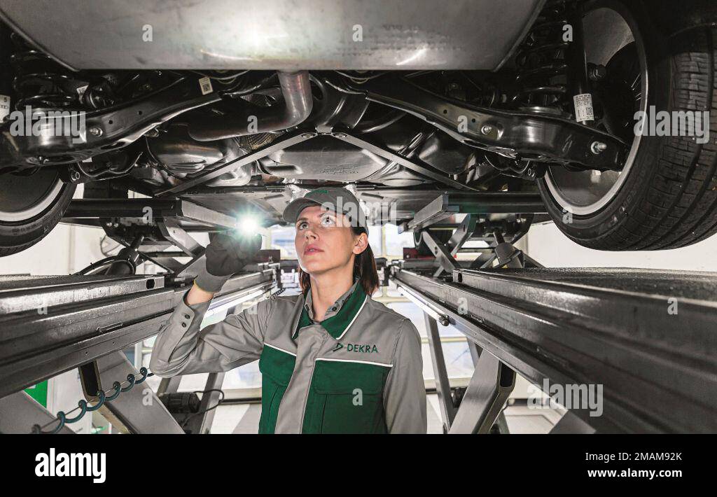 In this image released on Wednesday, September, 7, a DEKRA employee ...