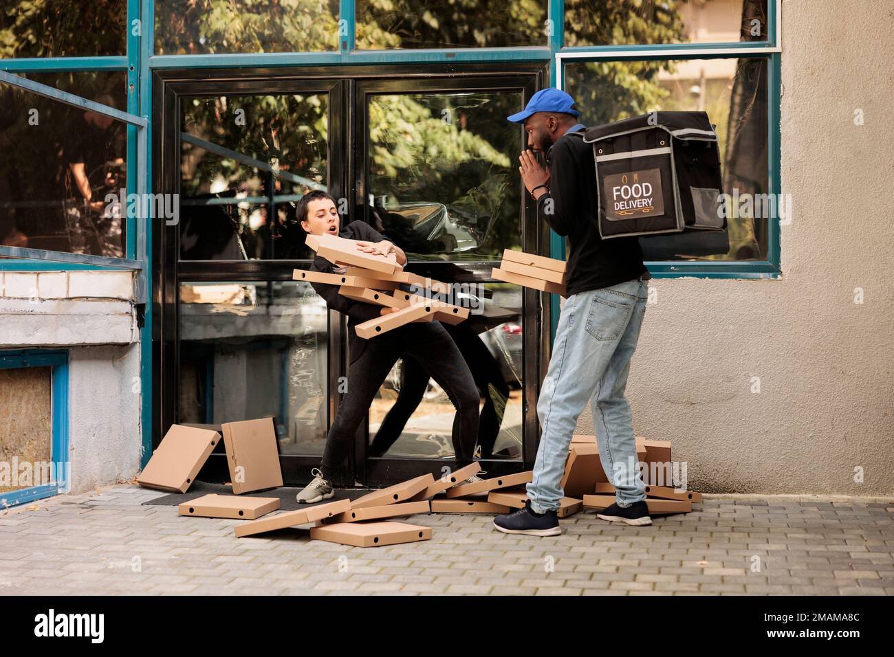 Confused office food delivery customer catching falling pizza boxes ...