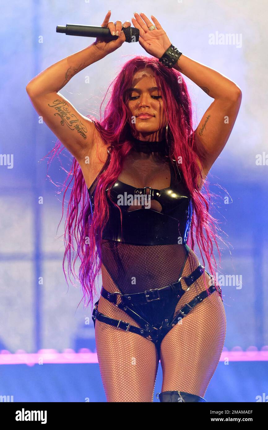 Karol G performs during the opening night of her "Strip Love" tour at ...