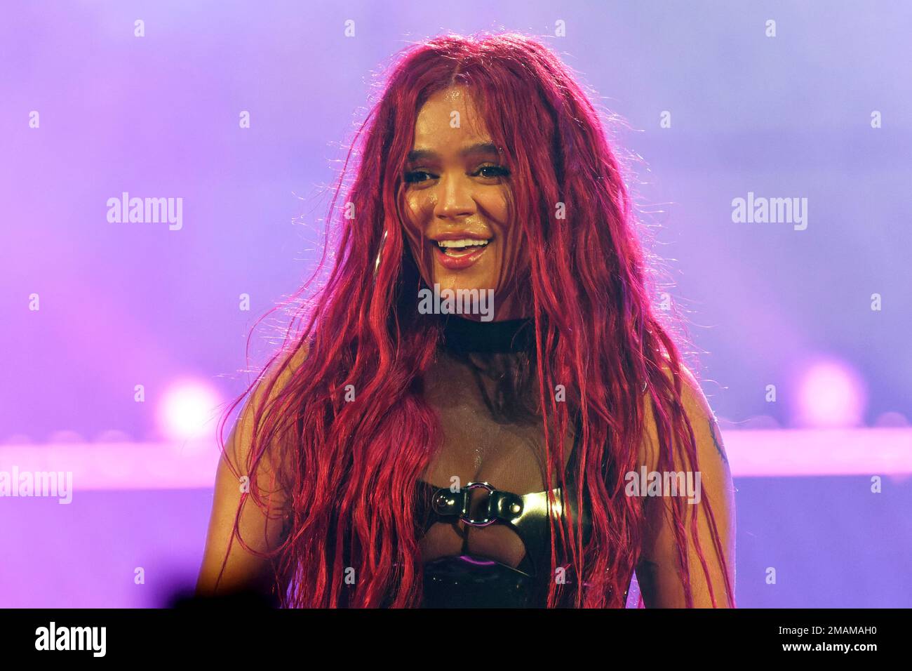 Karol G performs during the opening night of her "Strip Love" tour at ...