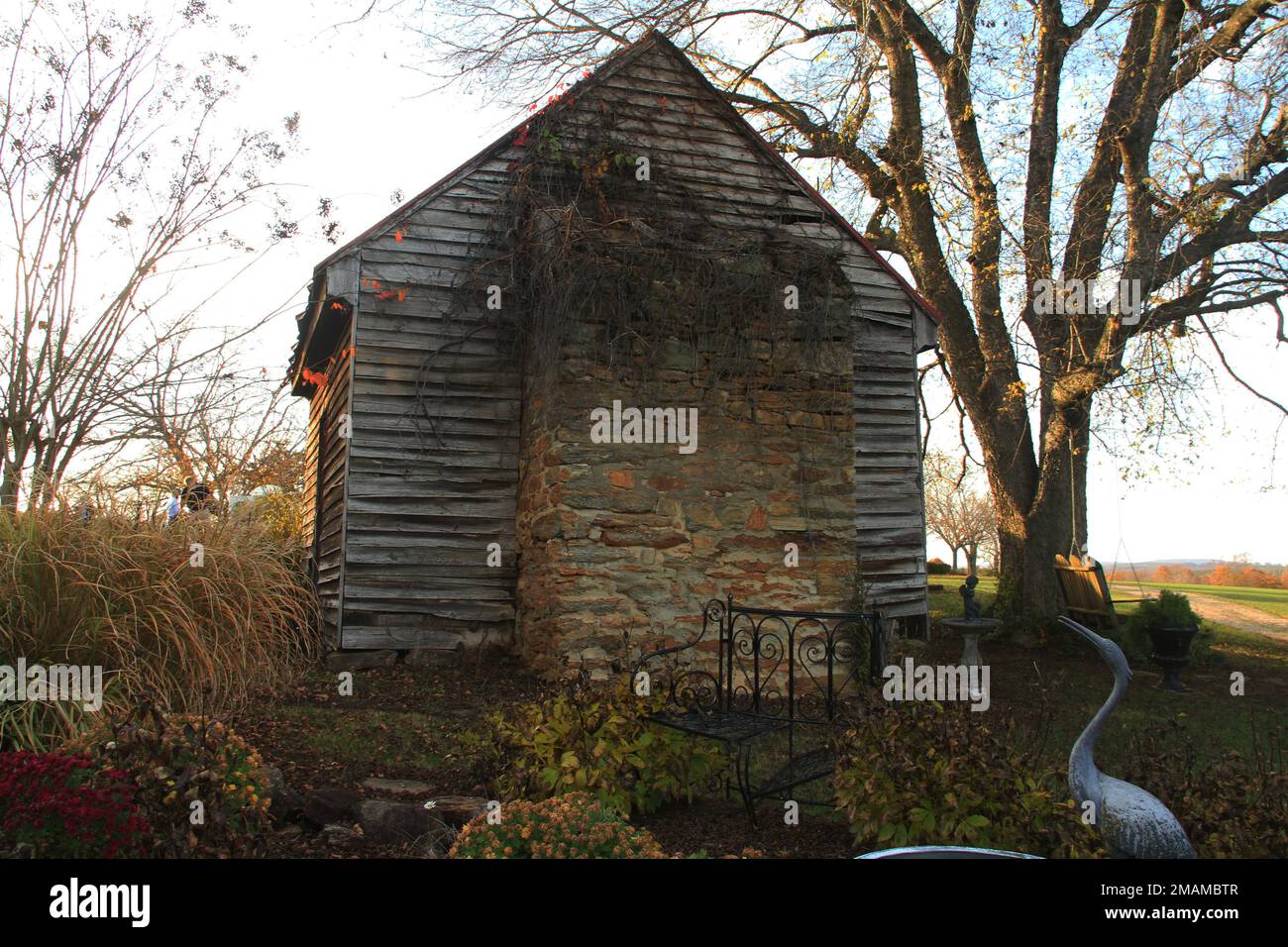 Small log cabin with stone chimney in Virginia, USA Stock Photo - Alamy