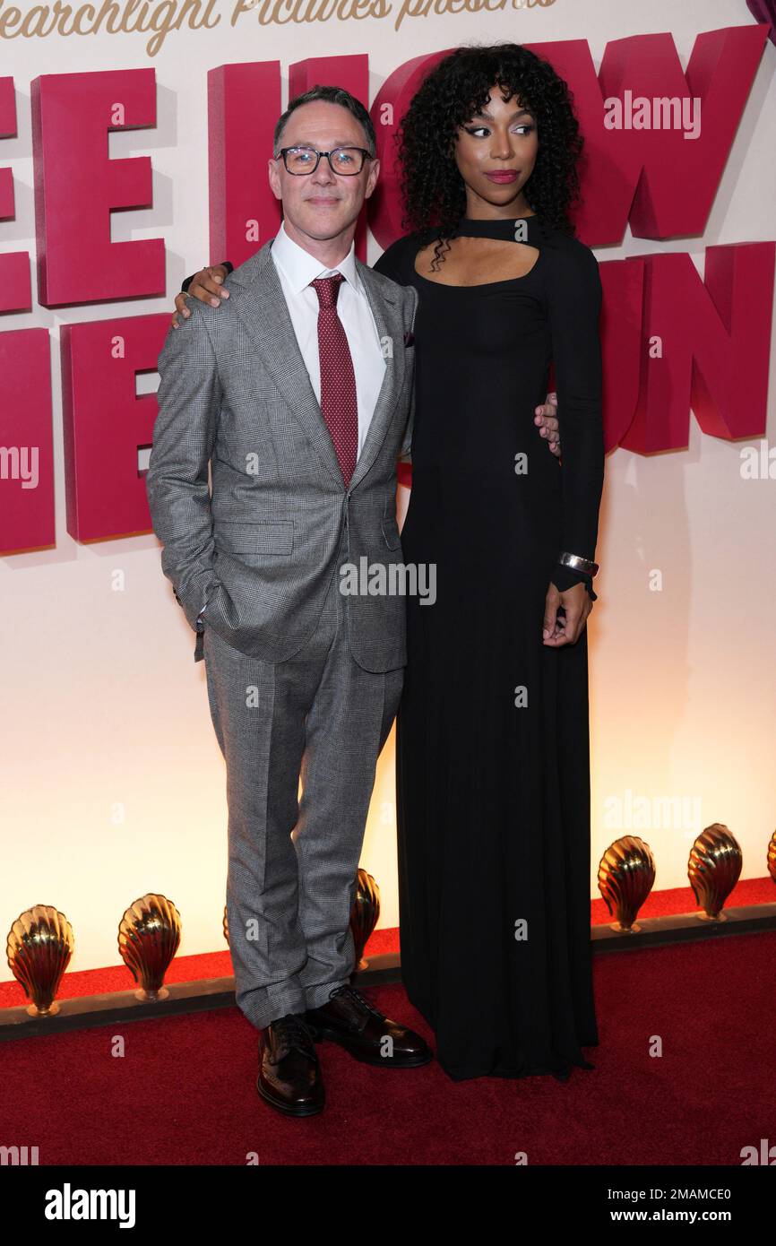 Reece Shearsmith, left, and Pippa Bennett-Warner pose for photographers ...