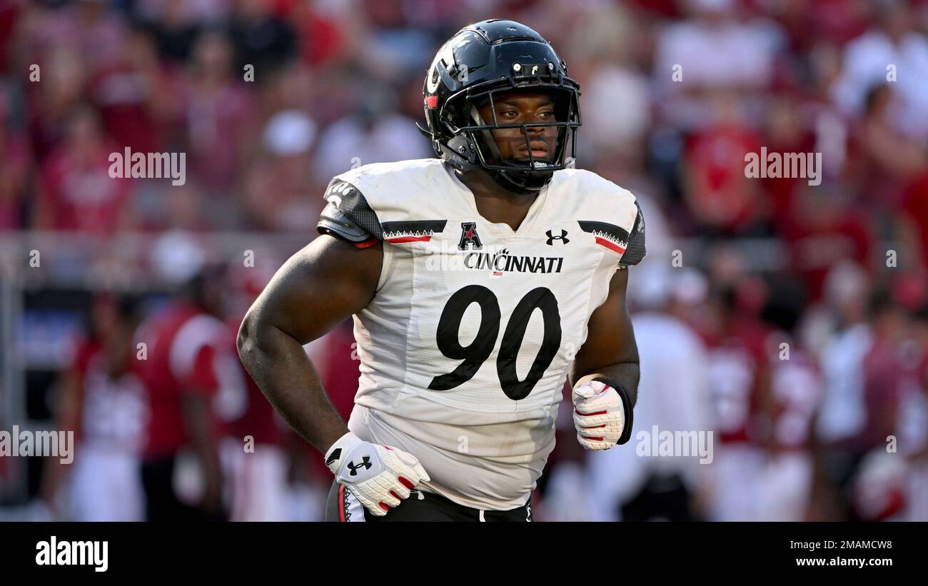 Cincinnati defensive lineman Jabari Taylor (90) runs a play against ...