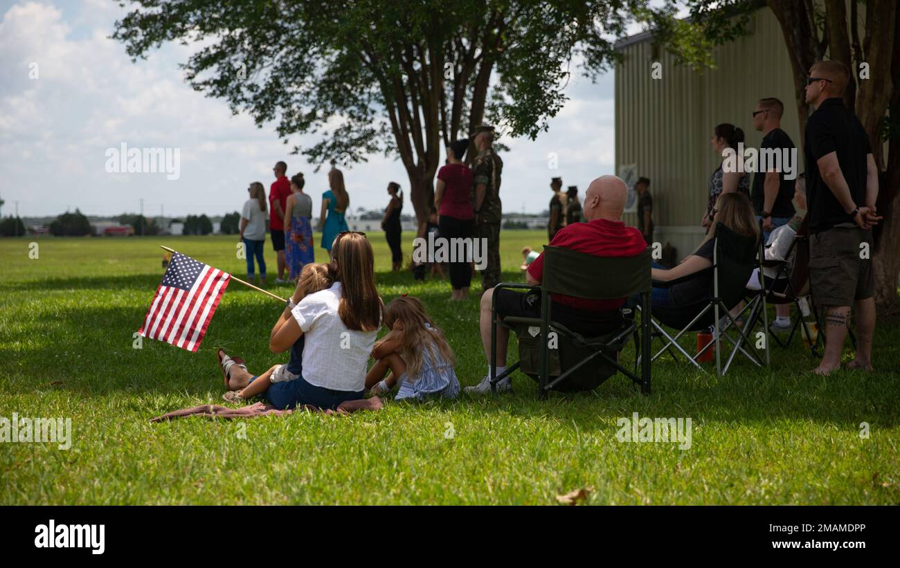 U.S. Marines and their families attend the 21-Minute Gun Salute on ...
