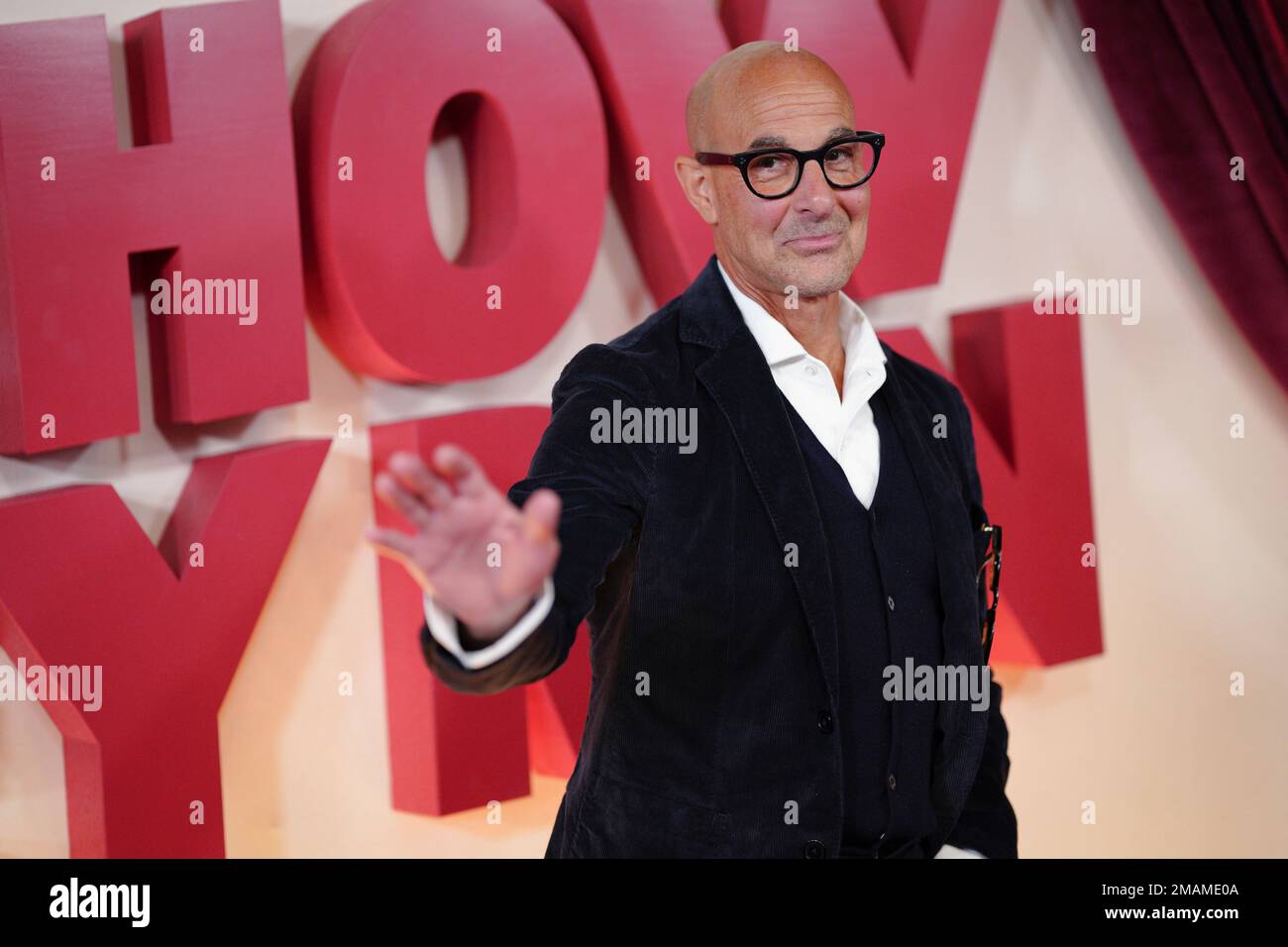 Stanley Tucci poses for photographers upon his arrival at the London ...