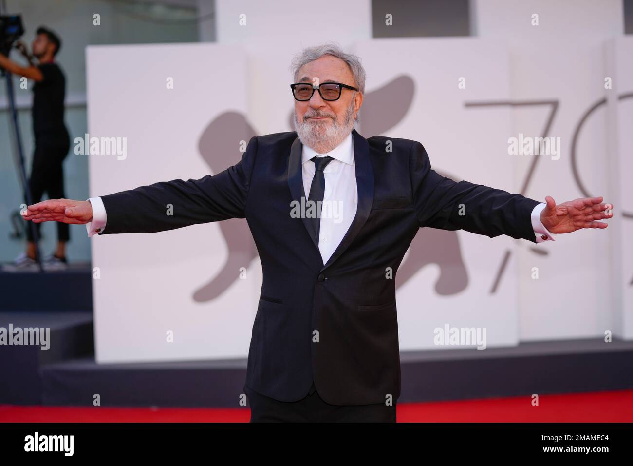 Director Gianni Amelio poses for photographers upon arrival at the ...
