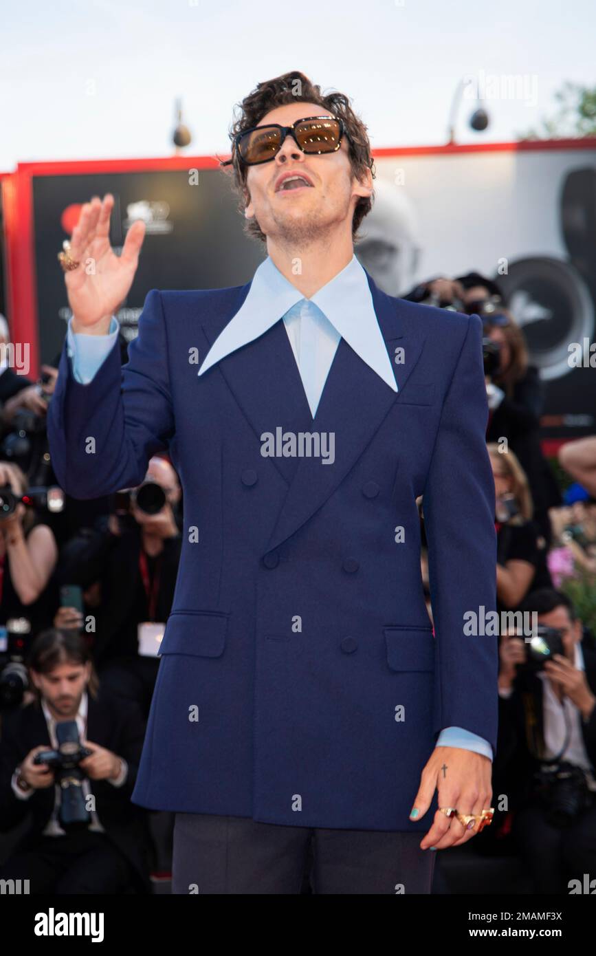 Harry Styles poses for photographers upon arrival at the premiere of ...