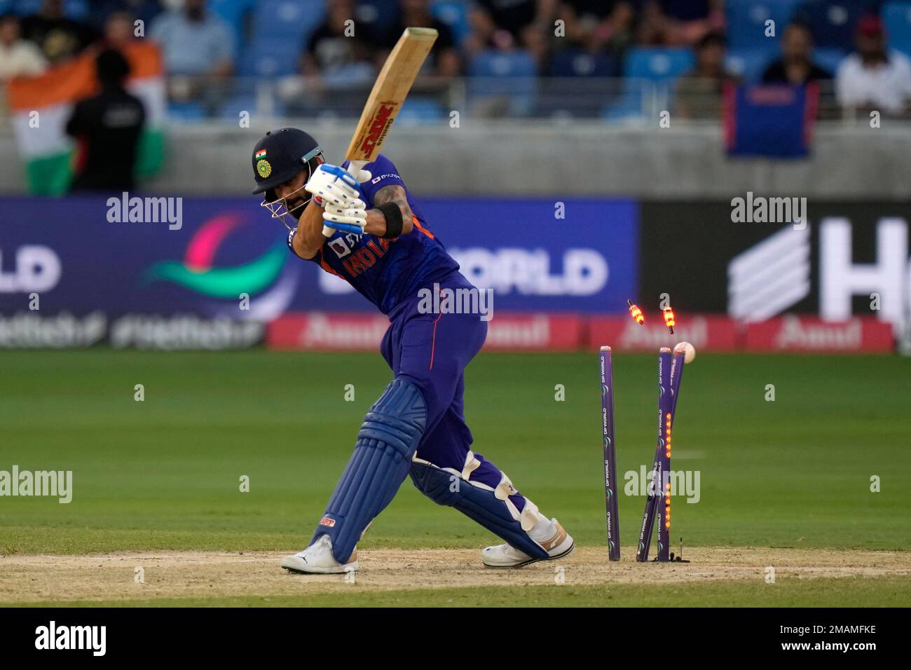 India's Virat Kohli is bowled out by Sri Lanka's Dilshan Madushanka ...