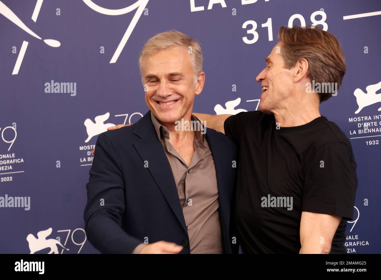 Christoph Waltz, left, and Willem Dafoe pose for photographers at the ...