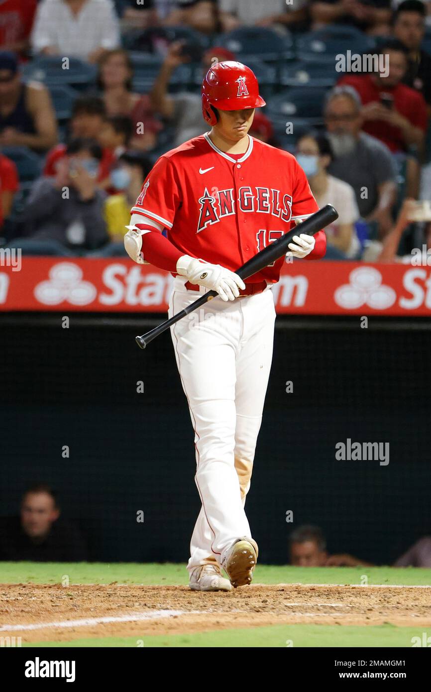 Los Angeles Angels' Shohei Ohtani (17) checks his bat before at bat ...